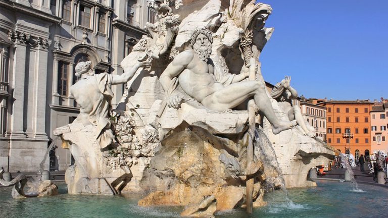 Visit Piazza Navona and its beautiful fountain by Bernini